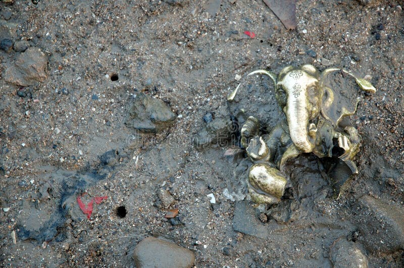 God Statue in the Mud India Stock Image - Image of beach, effect: 274054343