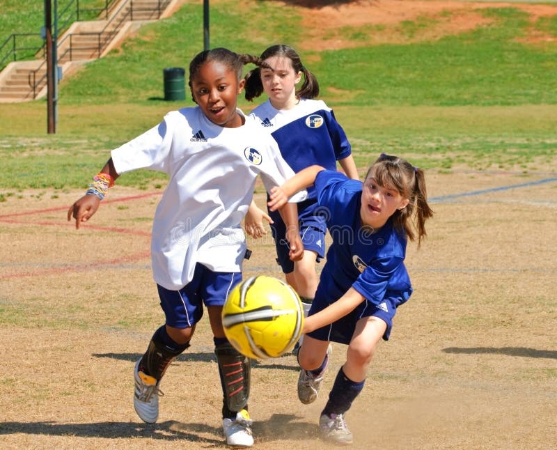 Going for the Ball editorial stock photo. Image of ball - 14208988