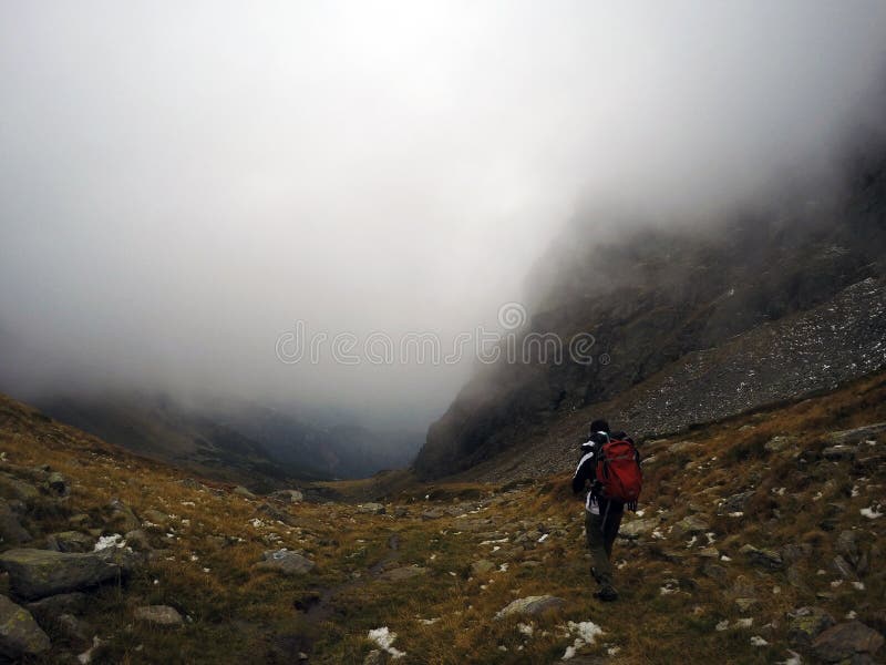 Going down the mountains stock photo. Image of dark, fagaras - 78221030