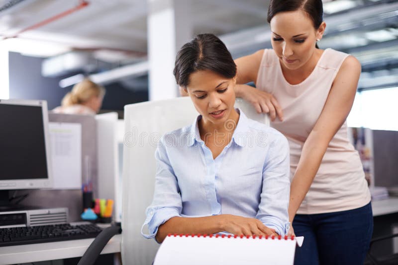 Going Over the Designs Together. Two Female Designers Working Together ...