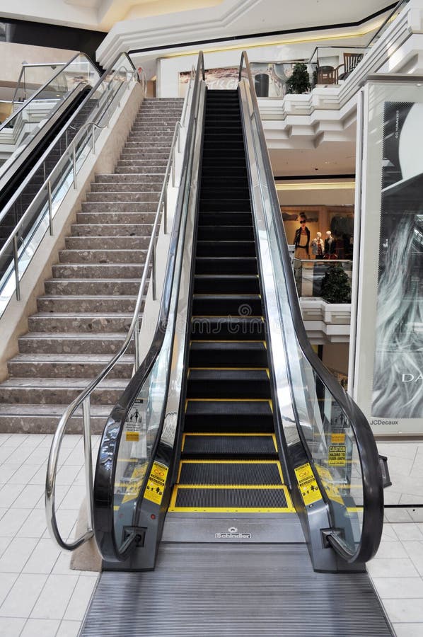 Going up the Escalator editorial photo. Image of indoor - 34487471