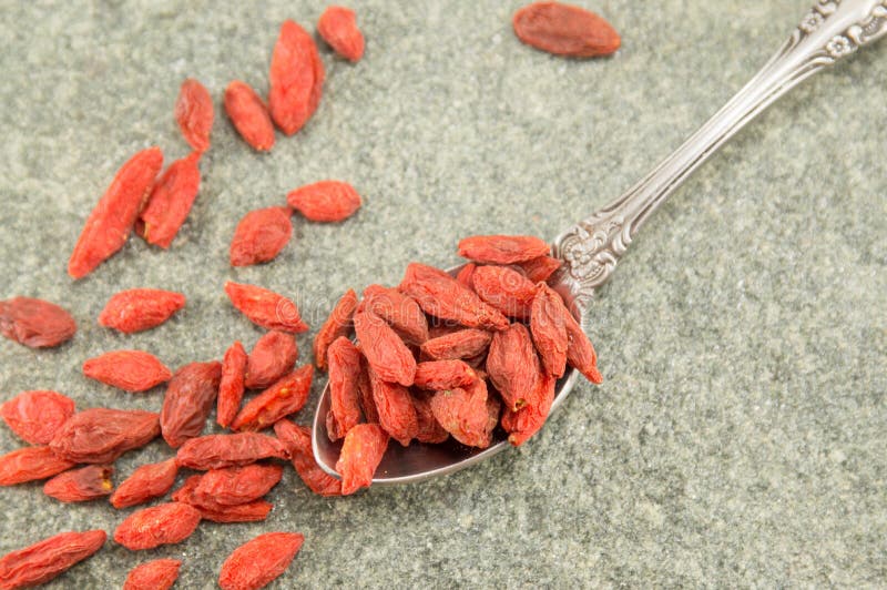 Goji berries in spoons stock image. Image of medicine - 82102099
