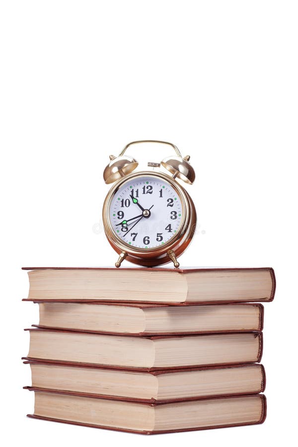 Gold Alarm Clock Stand on a Pile of Books Stock Photo - Image of hour ...