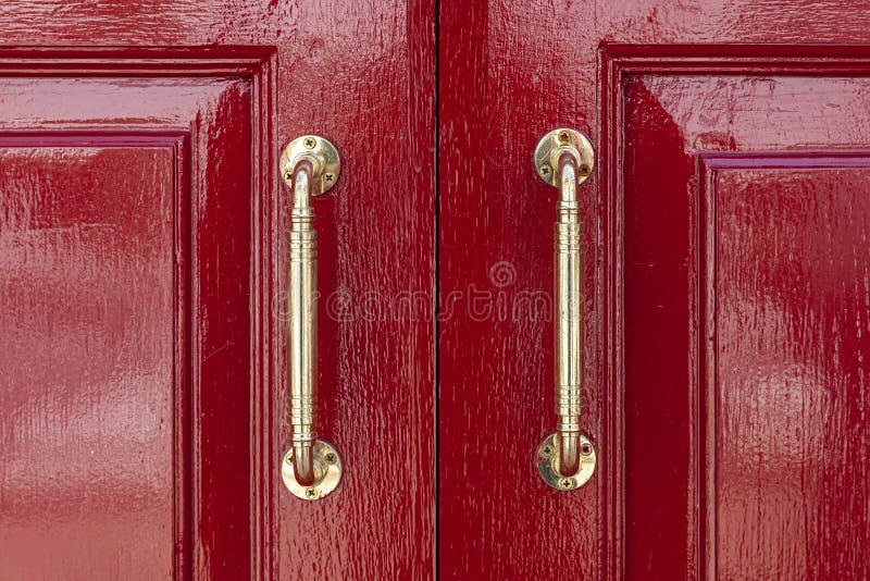 Aluminum Door Handle and Red Wood Door Stock Photo - Image of double ...