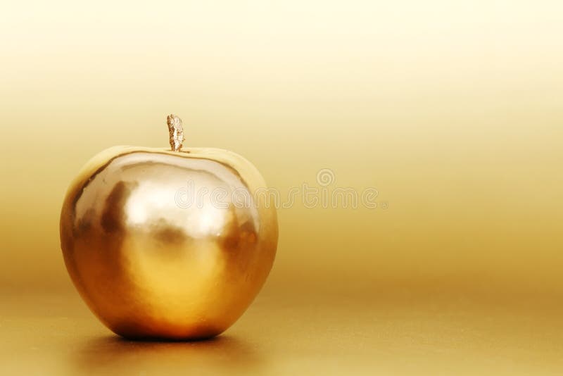 Gold apple. stock image. Image of goldish, rich, bright - 24013123
