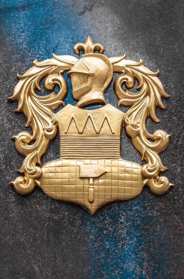 Gold Arms with Knight Image on Granite Wall. Stock Photo - Image of ...