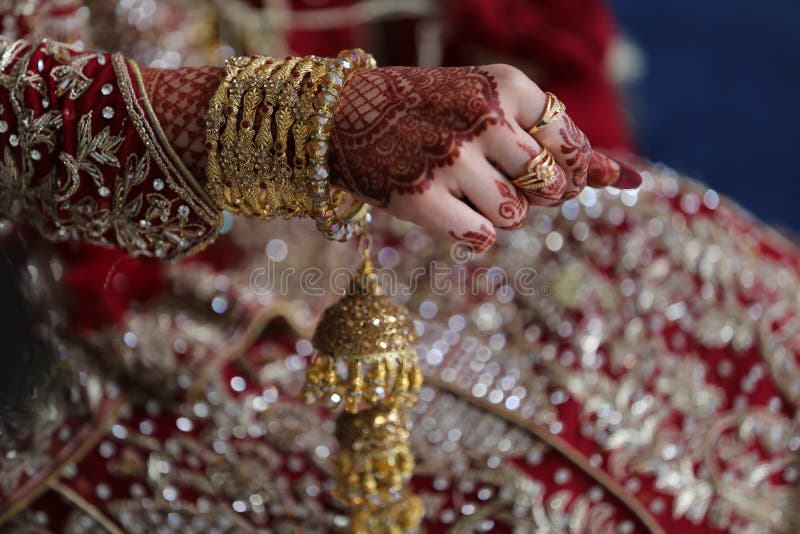 Gold Bangles in Bridal Hand. Stock Image - Image of spring, gold: 253719663