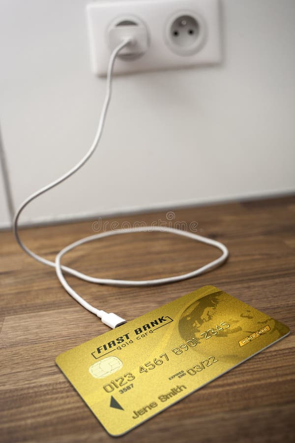 A Gold Bank Card Connected To a USB Socket Stock Photo - Image of ...