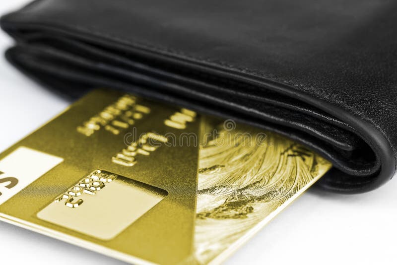 Gold bank card in a purse. stock photo. Image of debit - 64534048