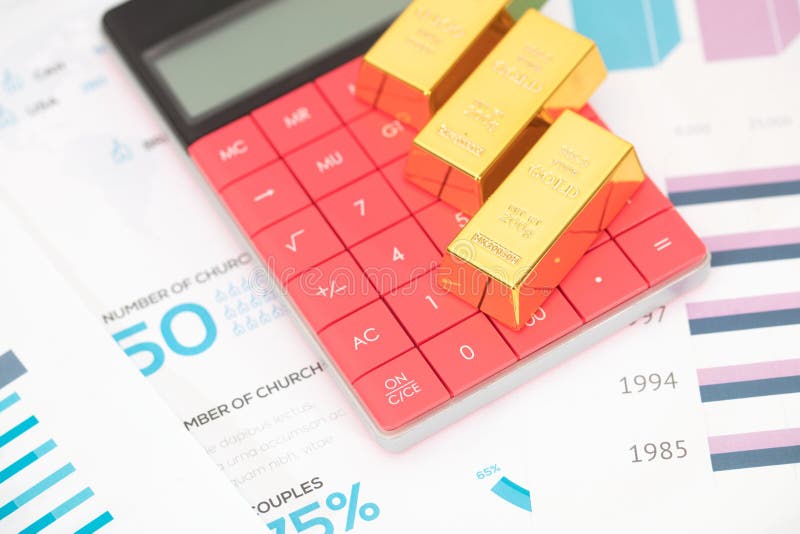 Gold Bar on Calculator Calculator on Paper Document Stock Image - Image ...