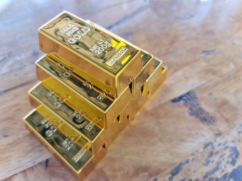 Gold Bar Placed on the Wooden Floor Stock Photo - Image of floor ...