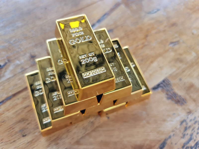 Gold Bar Placed on the Wooden Floor Stock Image - Image of floor ...