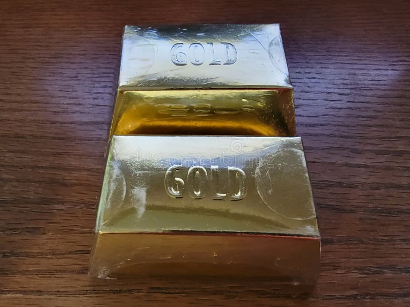 Gold Bars or Blocks on Wood Desk or Surface Stock Photo - Image of ...