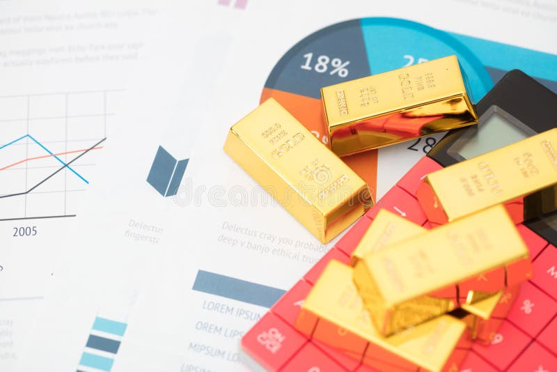 Gold Bars and Calculator on the Data File Stock Photo - Image of symbol ...