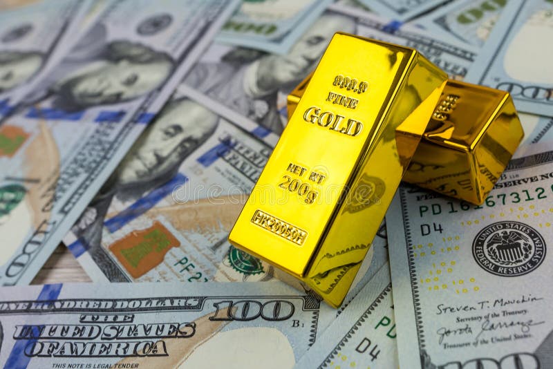 Gold bars on dollars stock photo. Image of market, bill - 278153920