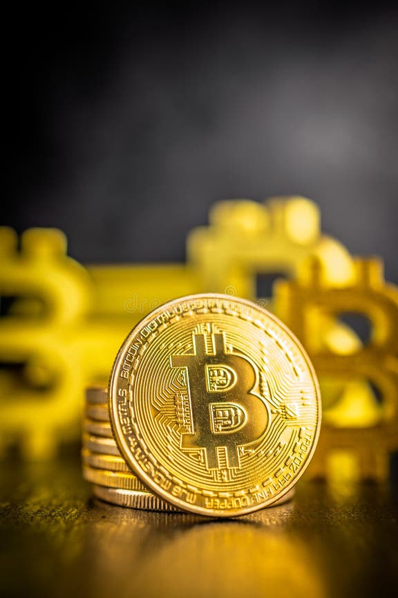 Gold Bitcoin Coin on Black Table. Gold Cryptocurrency Stock Image ...