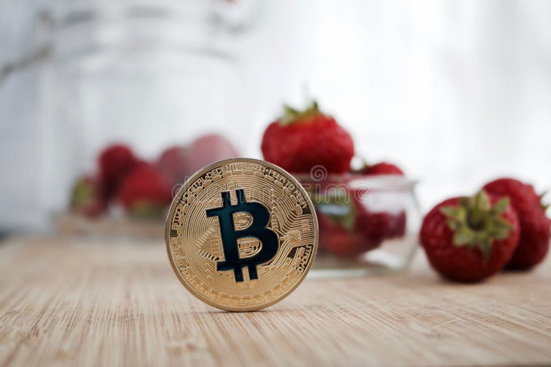 Gold bitcoin coin stock photo. Image of berry, strawberry - 93367782