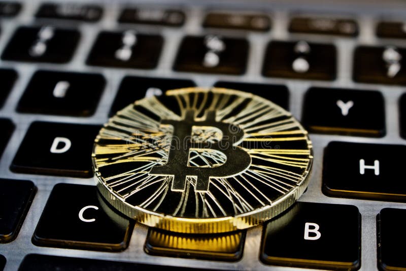 Gold Bitcoin Coin on the Keyboard Stock Image - Image of trade, savings ...