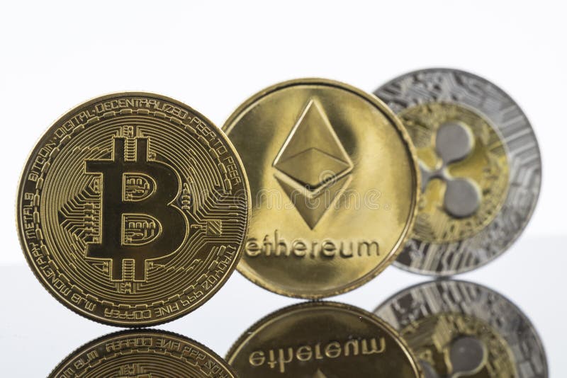 Gold Bitcoin, Etherium and Ripple Tokens in a Row Editorial Stock Image ...