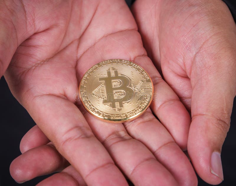 Bitcoin in Hand of Business Man Stock Image - Image of bronze, economy ...
