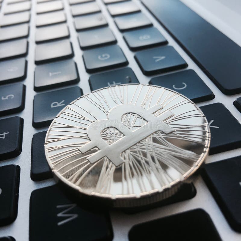 Gold bitcoin on keyboard stock photo. Image of finance - 94464760