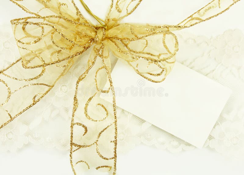 Gold Bow with Gift Tag stock image. Image of birthday - 14192695