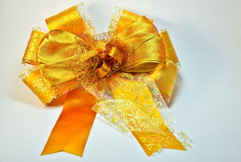 Gold Bow ribbon stock photo. Image of blue, celebration - 83466270