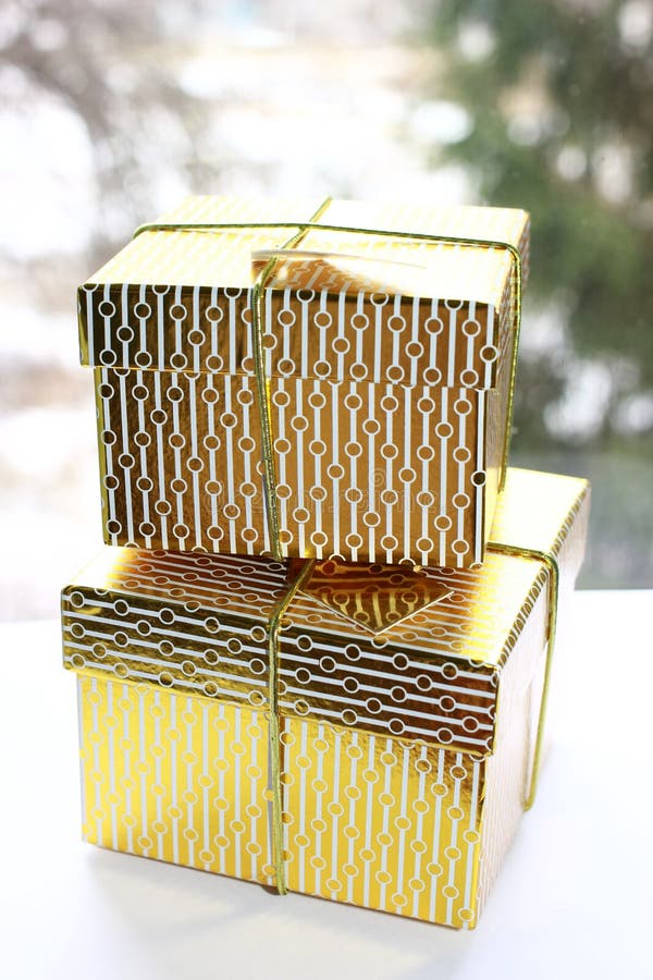 Red and Gold Boxes with Christmas Gifts Lie Under the White Tree Stock ...