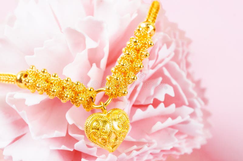 Gold Bracelet on Beautiful Pink Flower Stock Image - Image of luxury ...