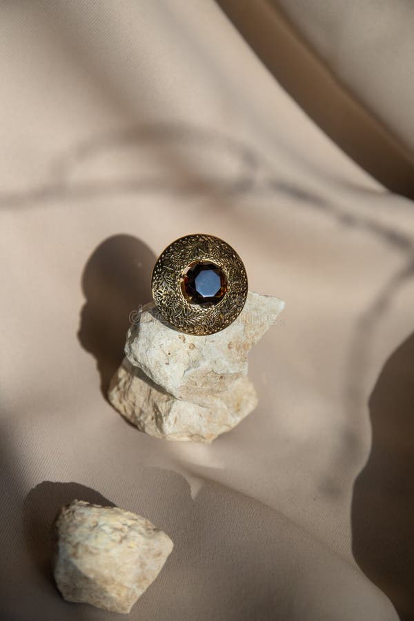 Gold brooch with ruby stock photo. Image of metal, black - 278342656