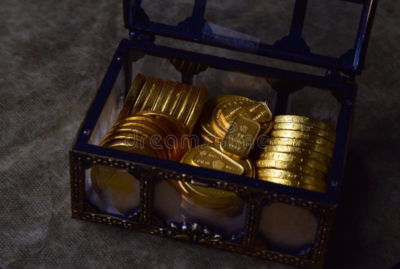 Gold Bullion between the Coins in the Box Stock Image - Image of cash ...
