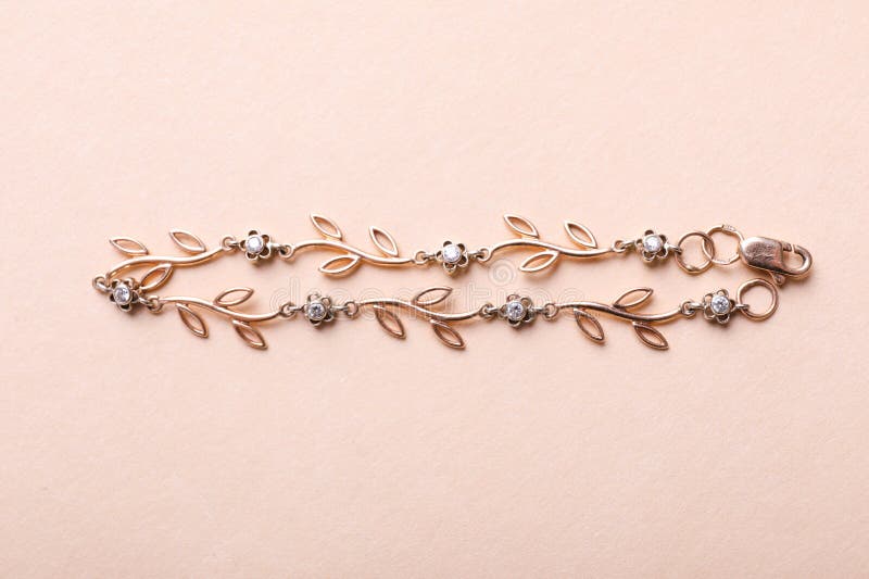 Gold Chain with Precious Stones in the Form of Flowers Stock Photo ...