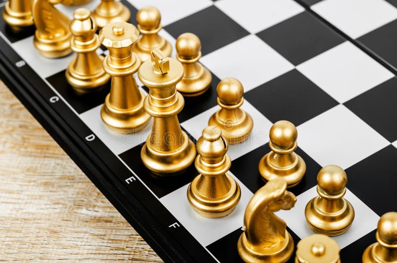 Gold chess pieces stock photo. Image of coach, metal - 237050342