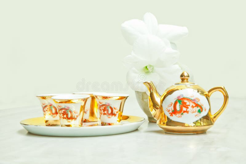 Gold chinese tea set stock photo. Image of liquid, traditional - 33595754