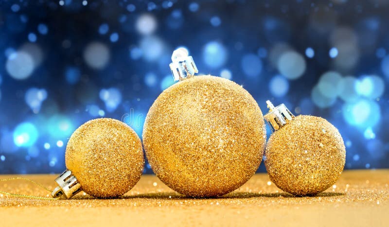 Gold Christmas Balls on Blue Christmas Background Stock Image - Image ...