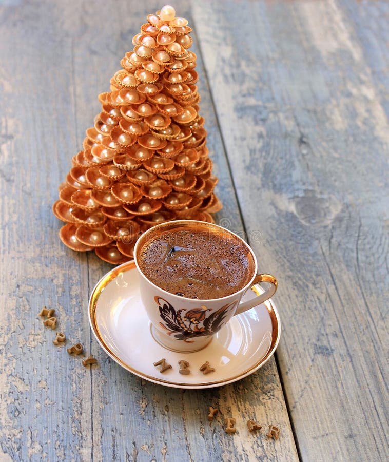 Gold Christmas Tree Made of Shells and Coffee Stock Photo - Image of ...