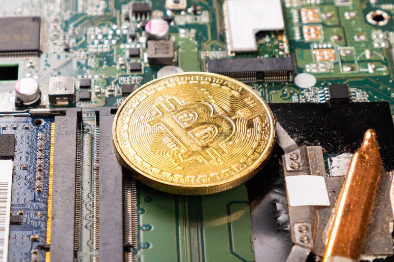 Gold Coin Bitcoin on a Computer Board, Mining Concept, Cryptocurrency ...