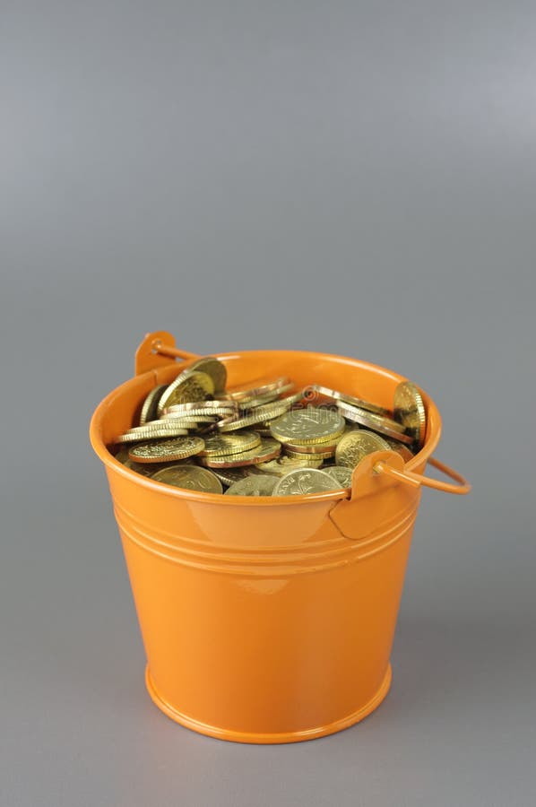 Gold Coins in the Bucket - Financial Concept Stock Image - Image of ...