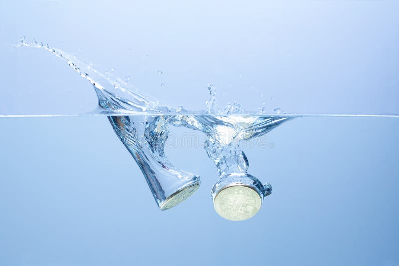 Gold Coins Dropped into the Water Stock Photo - Image of fresh ...