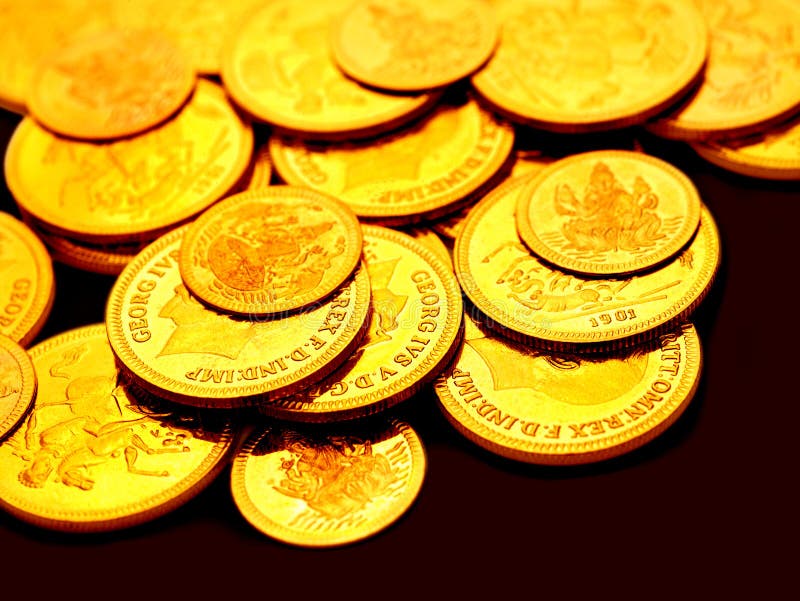 Gold Coins Embossed with Images Stock Photo - Image of strewn, wealthy ...