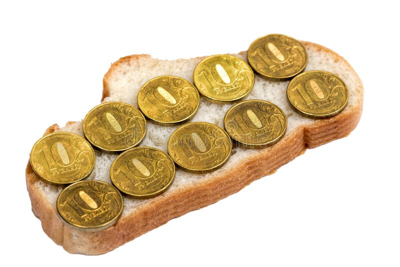 Gold Coins on Piece of White Bread Stock Image - Image of finance ...