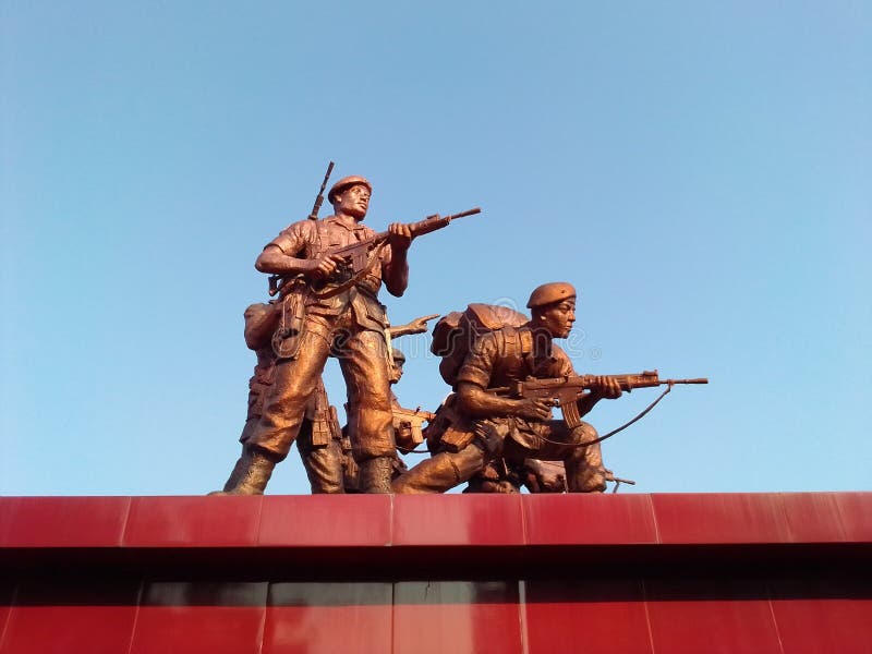 Gold Color Army Statue with Clear Blue Sky or Blue. Stock Photo - Image ...