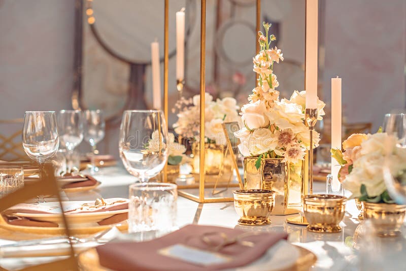 Gold Color Floral Decorations on a Wedding Table Stock Photo - Image of ...