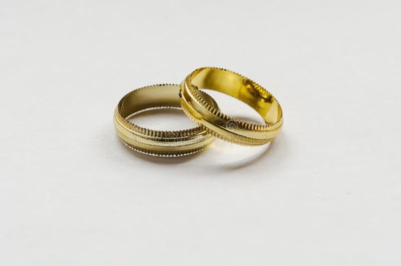 Gold Color Rings on White Background Stock Image - Image of twin ...