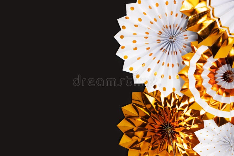 Gold Colored Paper Fans on a Black Background. Stock Photo - Image of ...