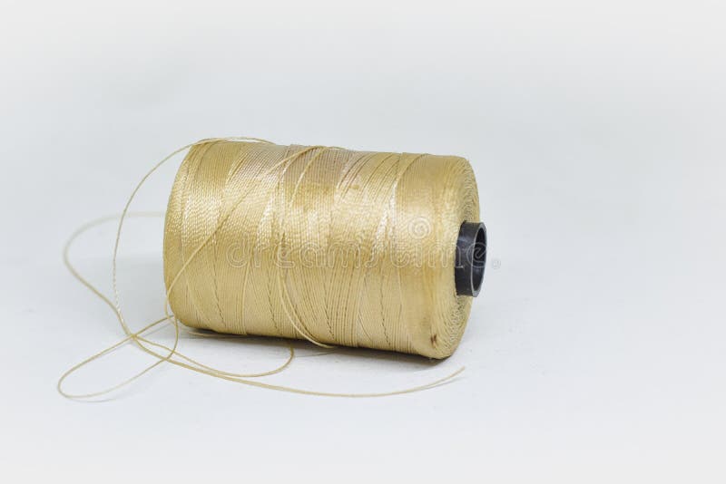 Gold Cotton Yarn on Spool, Yarn on Tube,wool Stock Image - Image of ...