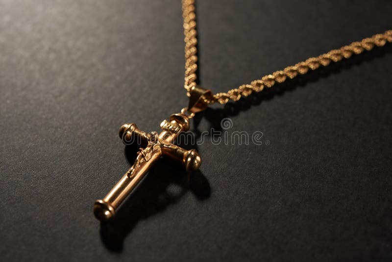 Gold Cross on a Chain on a Black Background Stock Image - Image of ...