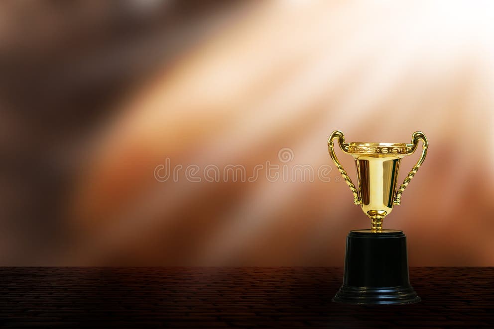 Gold cup on the table stock image. Image of event, contest - 96350529