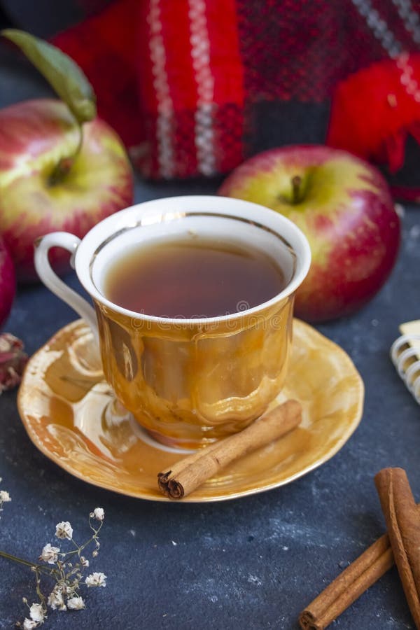 Cup of tea with red apple stock photo. Image of liquid - 123984074