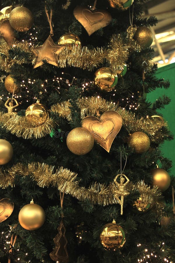 Gold Decorated Christmas Tree Stock Image - Image of shop, sale: 105205875